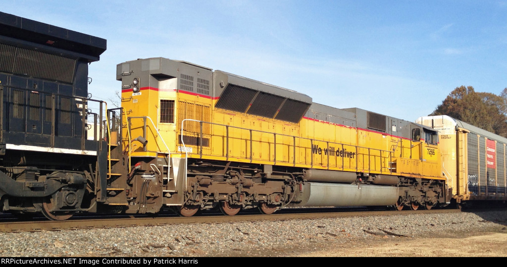 NS 7266 X-UP 8038 SD90MAC rear view as it rumbles through Mableton Ga at Church street as it ...